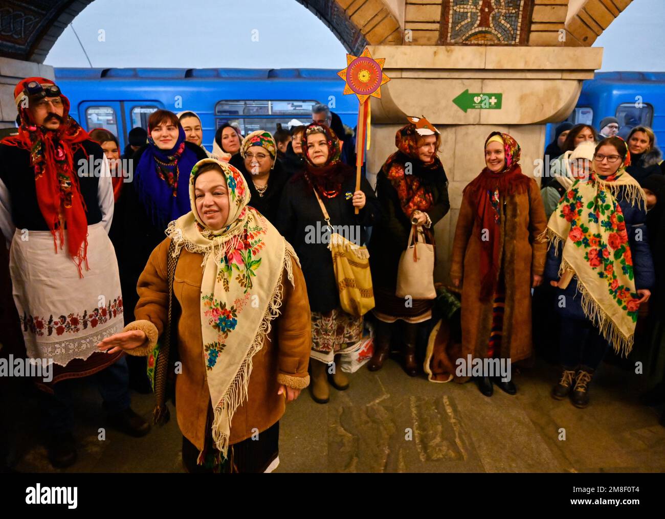 Ukrainians dressed in folk costumes celebrate the folk holiday Malanka ...