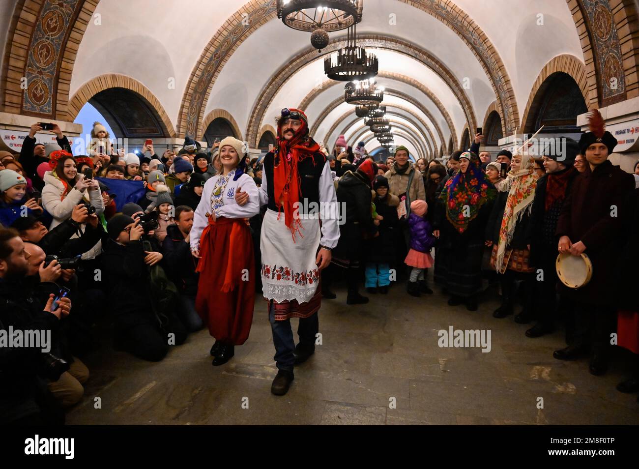 Ukrainians dressed in folk costumes celebrate the folk holiday Malanka ...