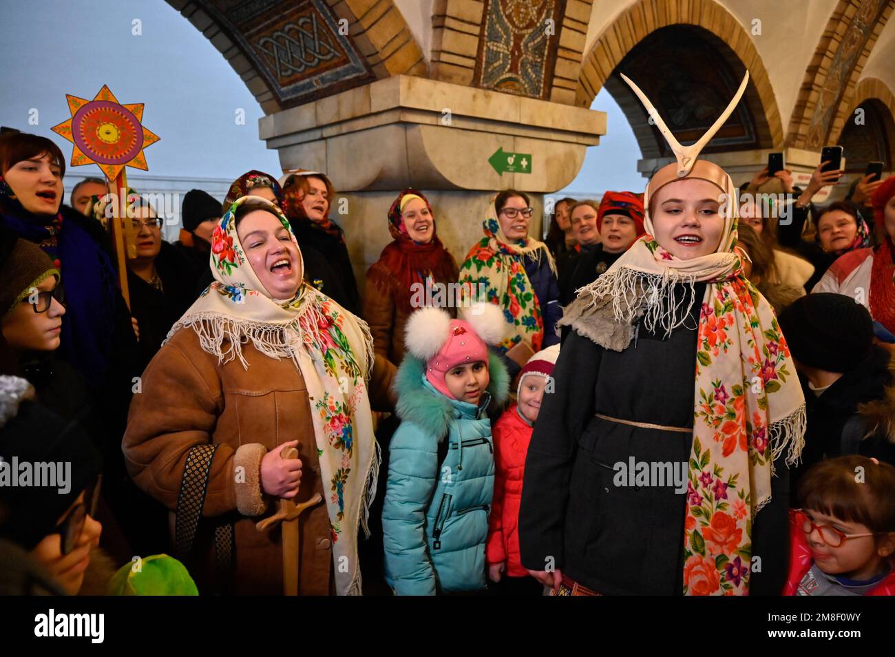 Ukrainians dressed in folk costumes celebrate the folk holiday Malanka ...
