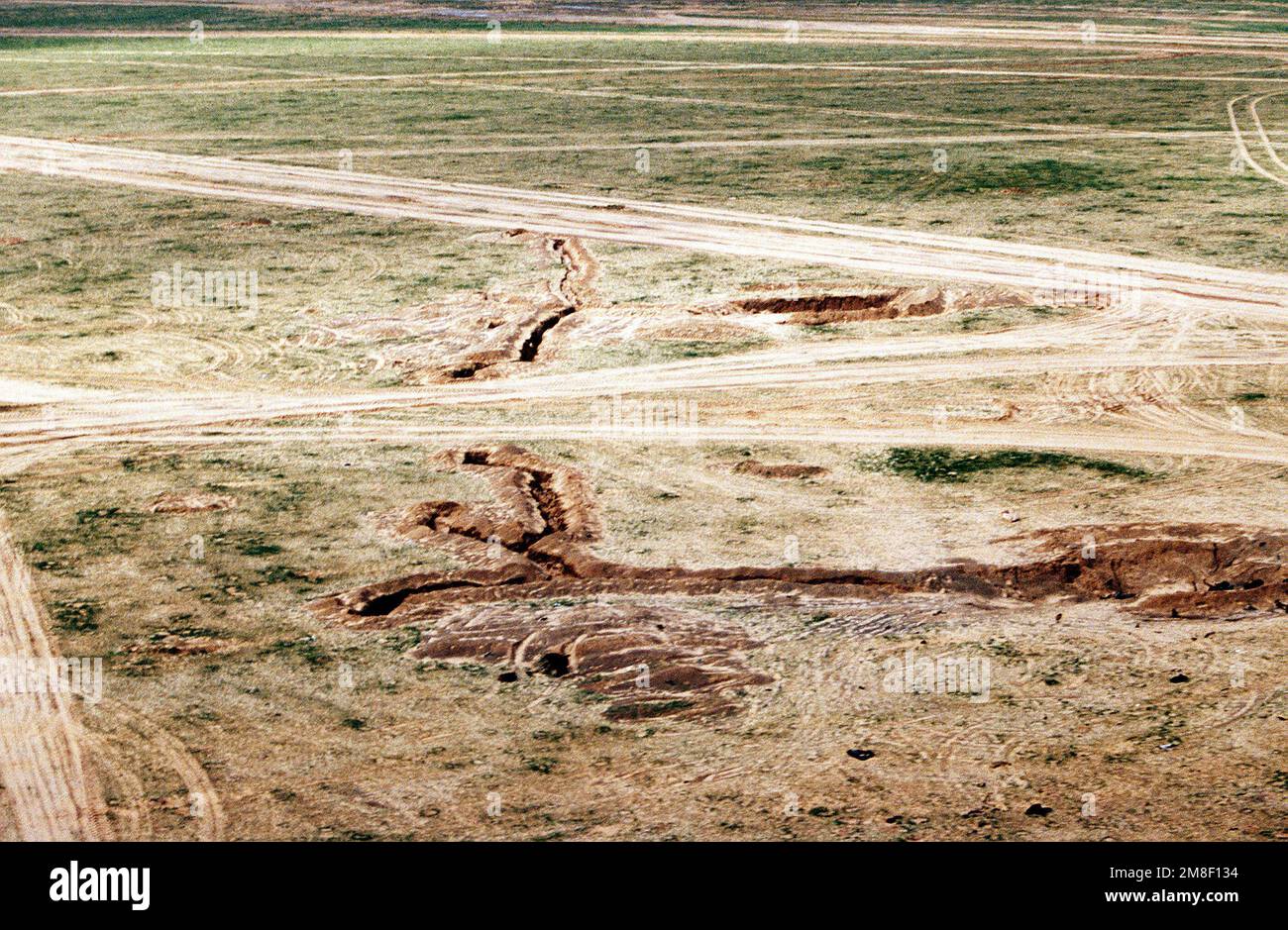 An aerial view of a section of Iraqi field fortifications abandoned ...