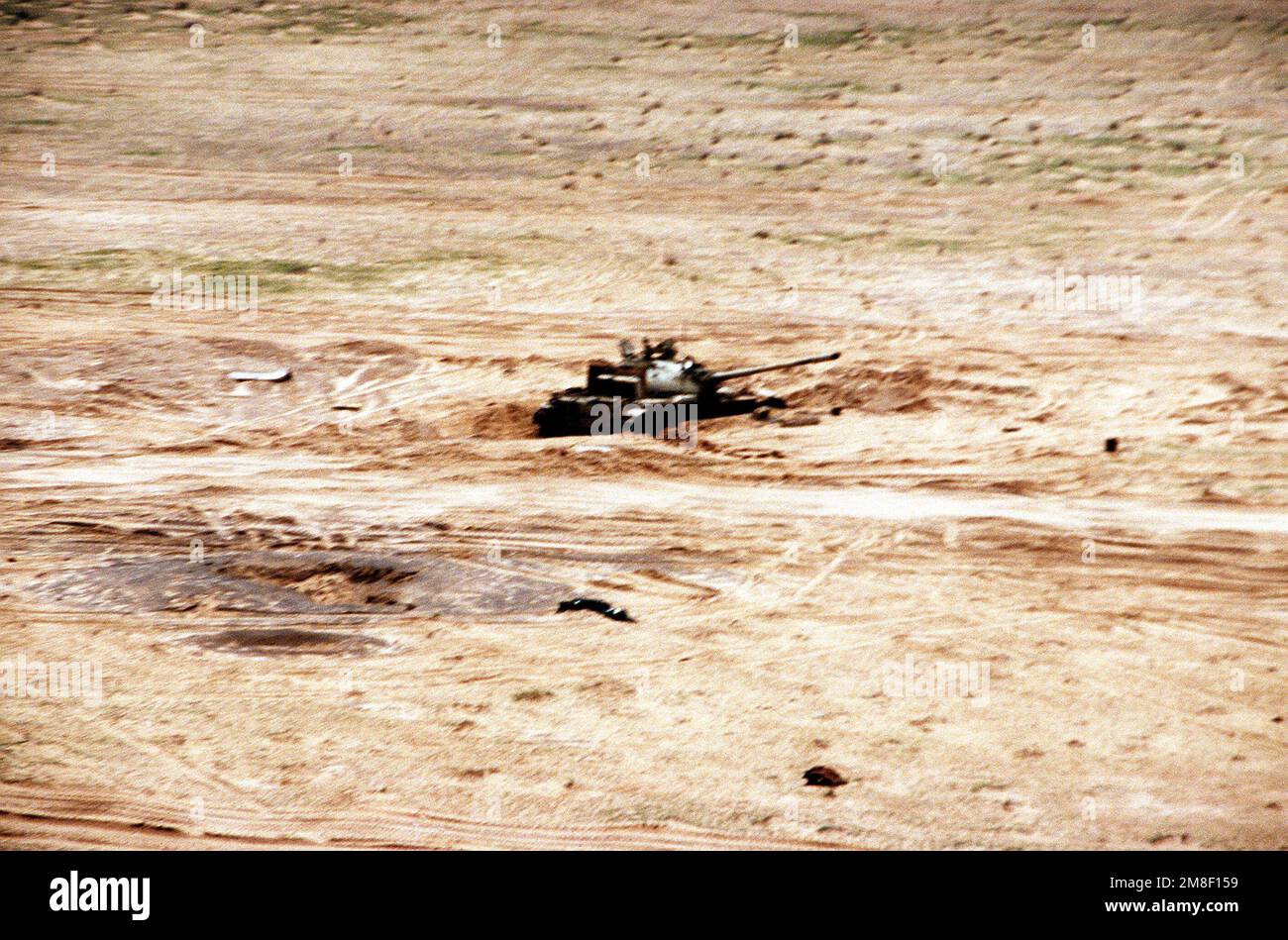 An Iraqi T-55 main battle tank abandoned during Operation Desert Storm ...