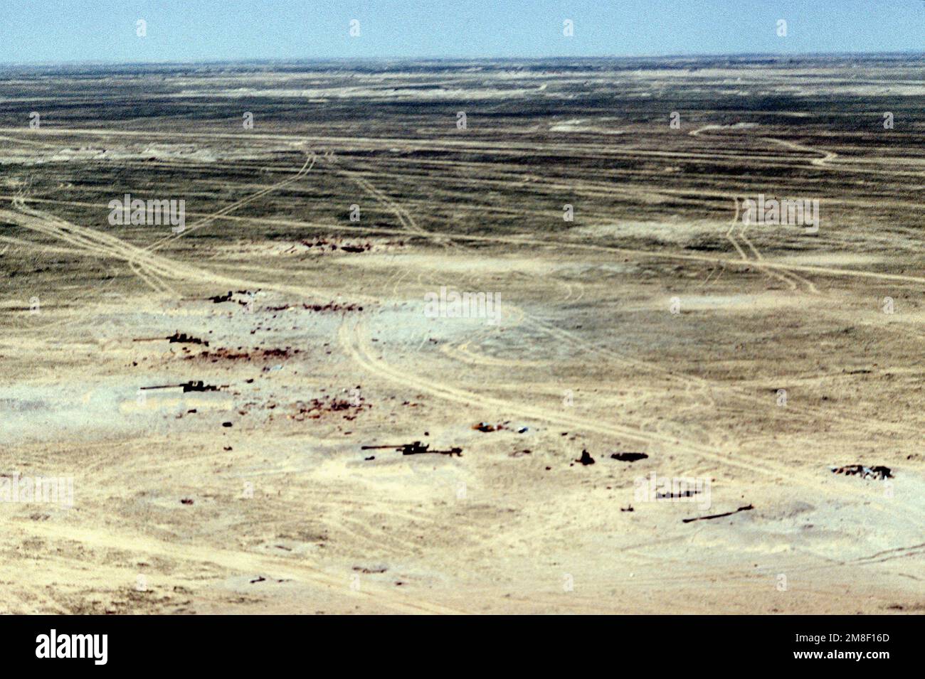 An Iraqi artillery battery abandoned during Operation Desert Storm ...