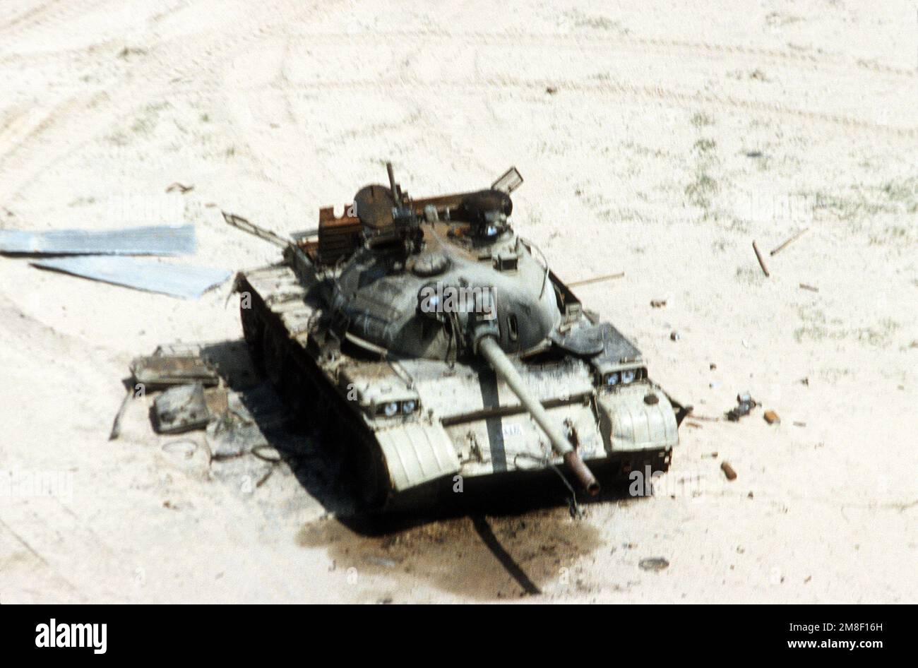 An Iraqi T-55 main battle tank destroyed during Operation Desert Storm ...