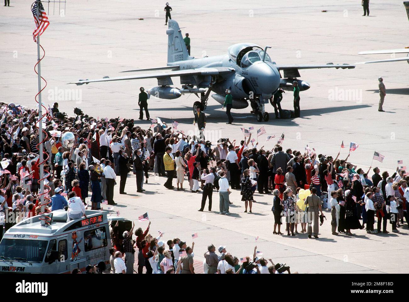 Ground crew members inspect an Attack Squadron 75 (VA-75) A-6E Intruder ...
