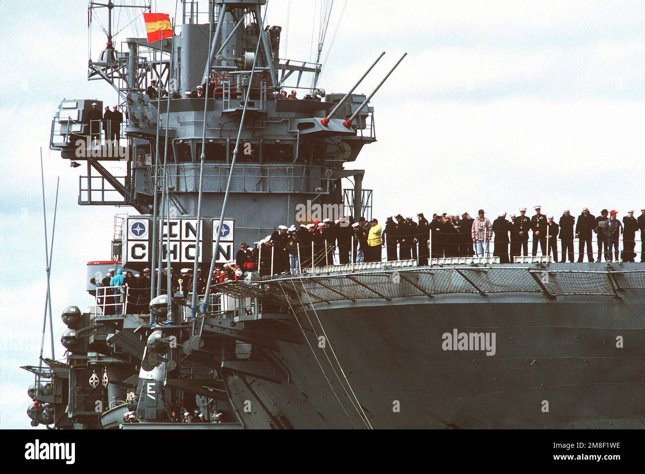 Sailors and Marines of the amphibious assault ship USS Inchon (LPH-12 ...