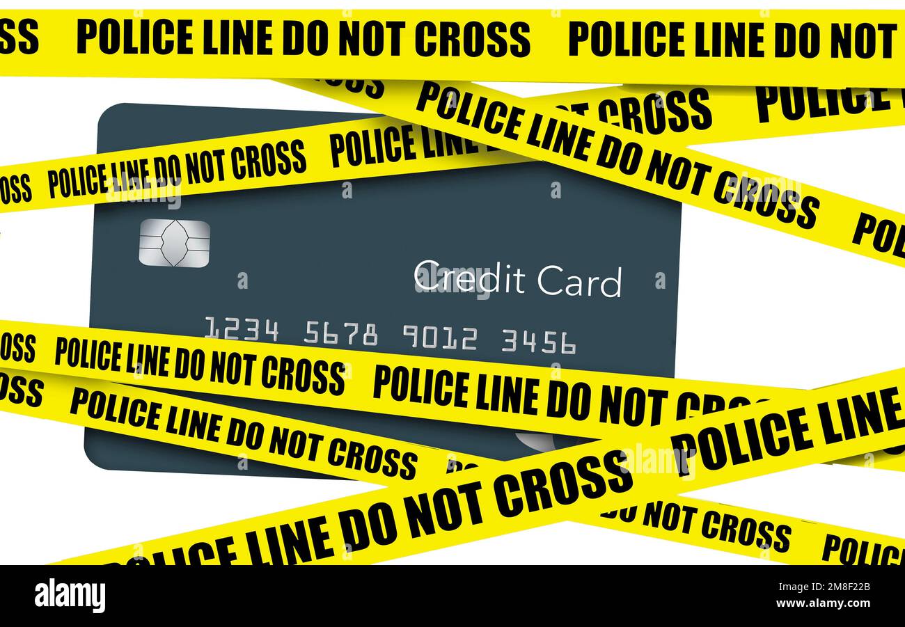 Yellow crime scene tape is seen covering a generic credit card on a white background. This is a ...
