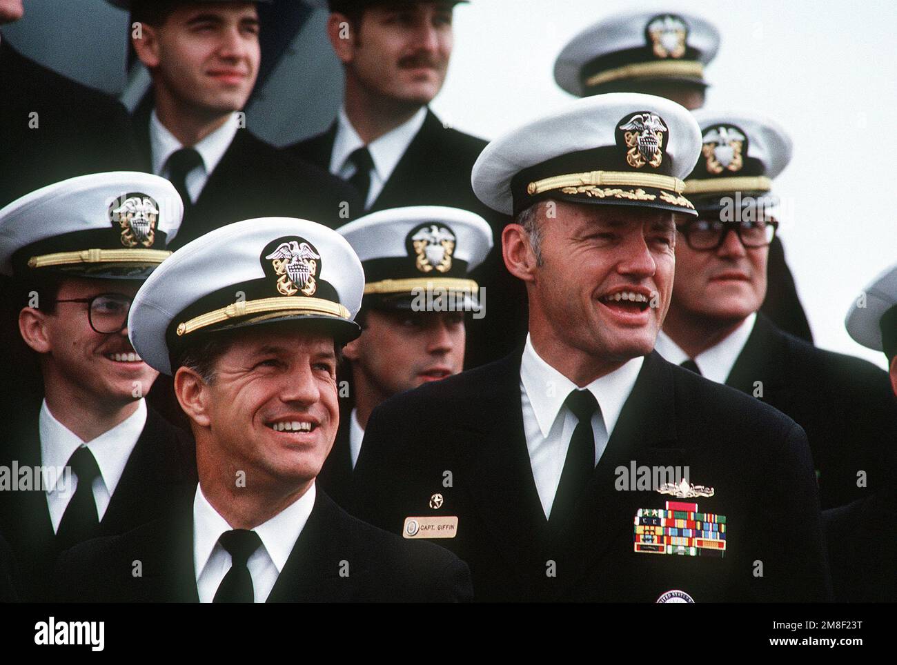 CAPT. Henry C. Giffin III, right, commanding officer of the guided ...
