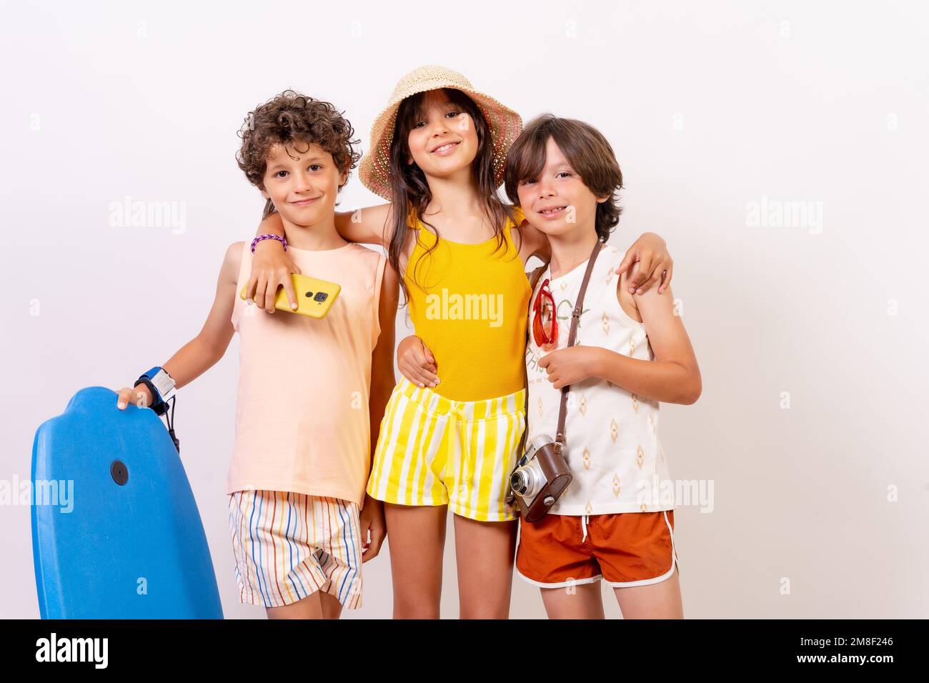 Portrait kids smiling and having fun on summer vacation on a white ...