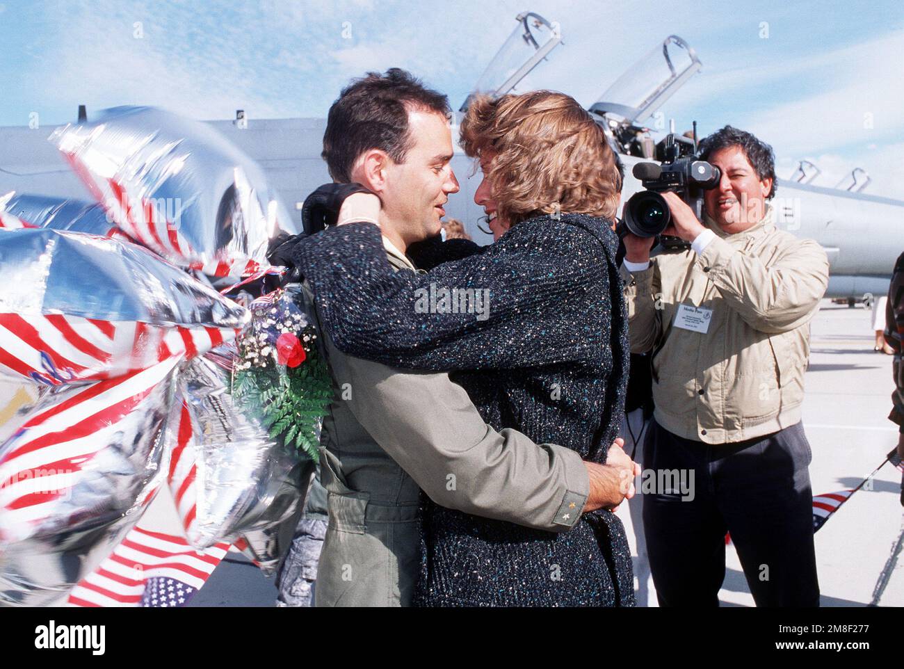 CAPT. Mark Houston is reunited with his wife, Karen, upon his return to ...