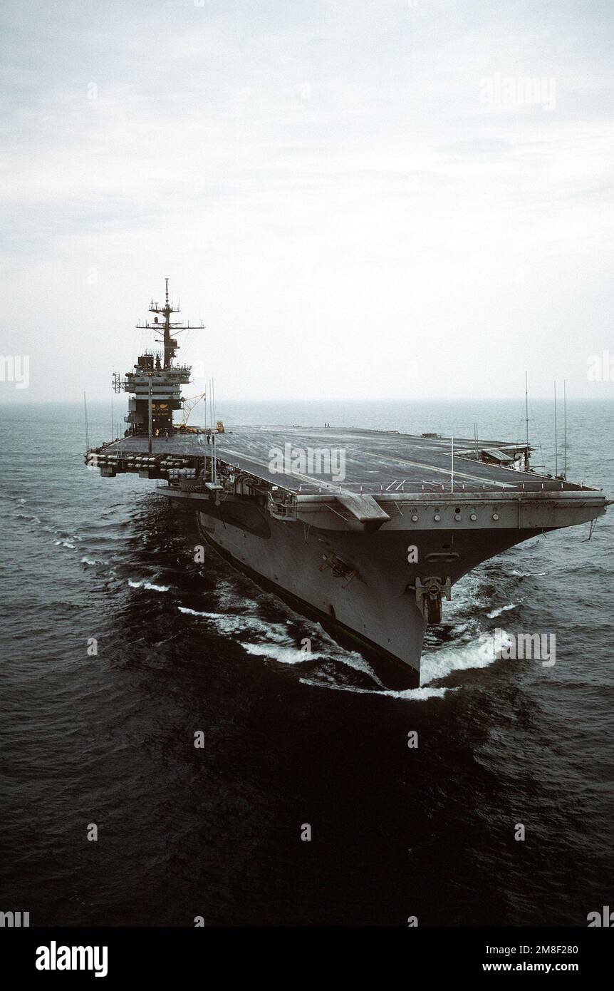A starboard bow view of the aircraft carrier USS JOHN F. KENNEDY (CV-67 ...