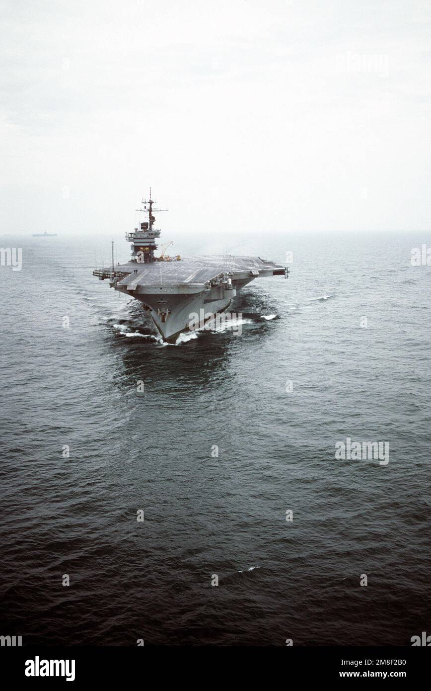 A bow view of the aircraft carrier USS JOHN F. KENNEDY (CV-67) underway ...