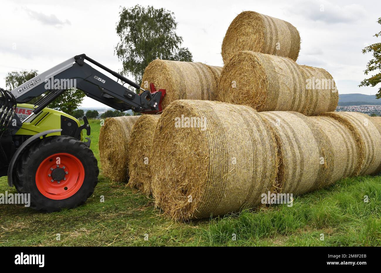 Stacking hay bales hi-res stock photography and images - Alamy