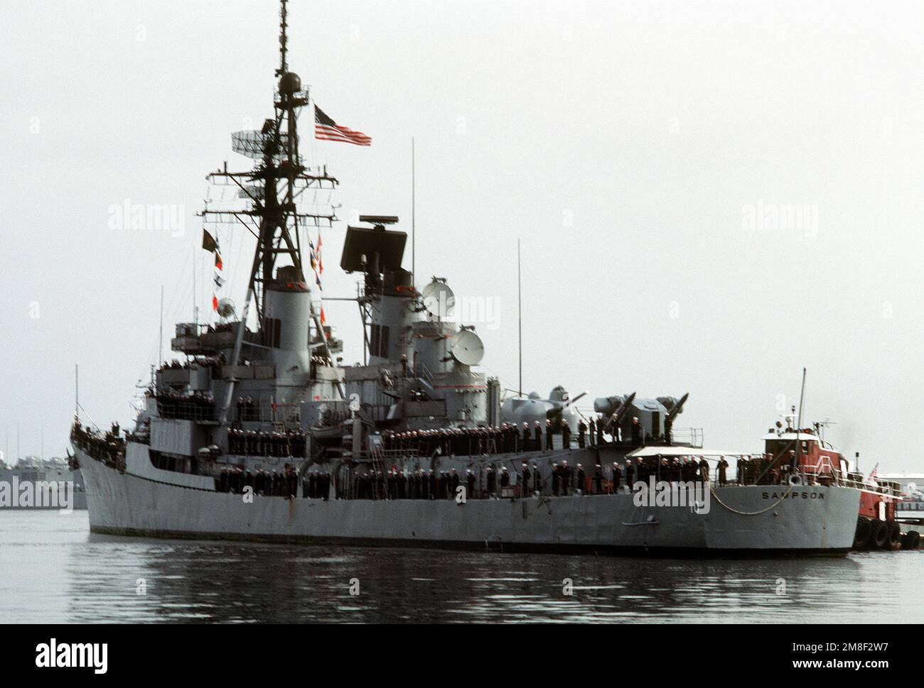 Crew members aboard the guided missile destroyer USS SAMPSON (DDG-10 ...