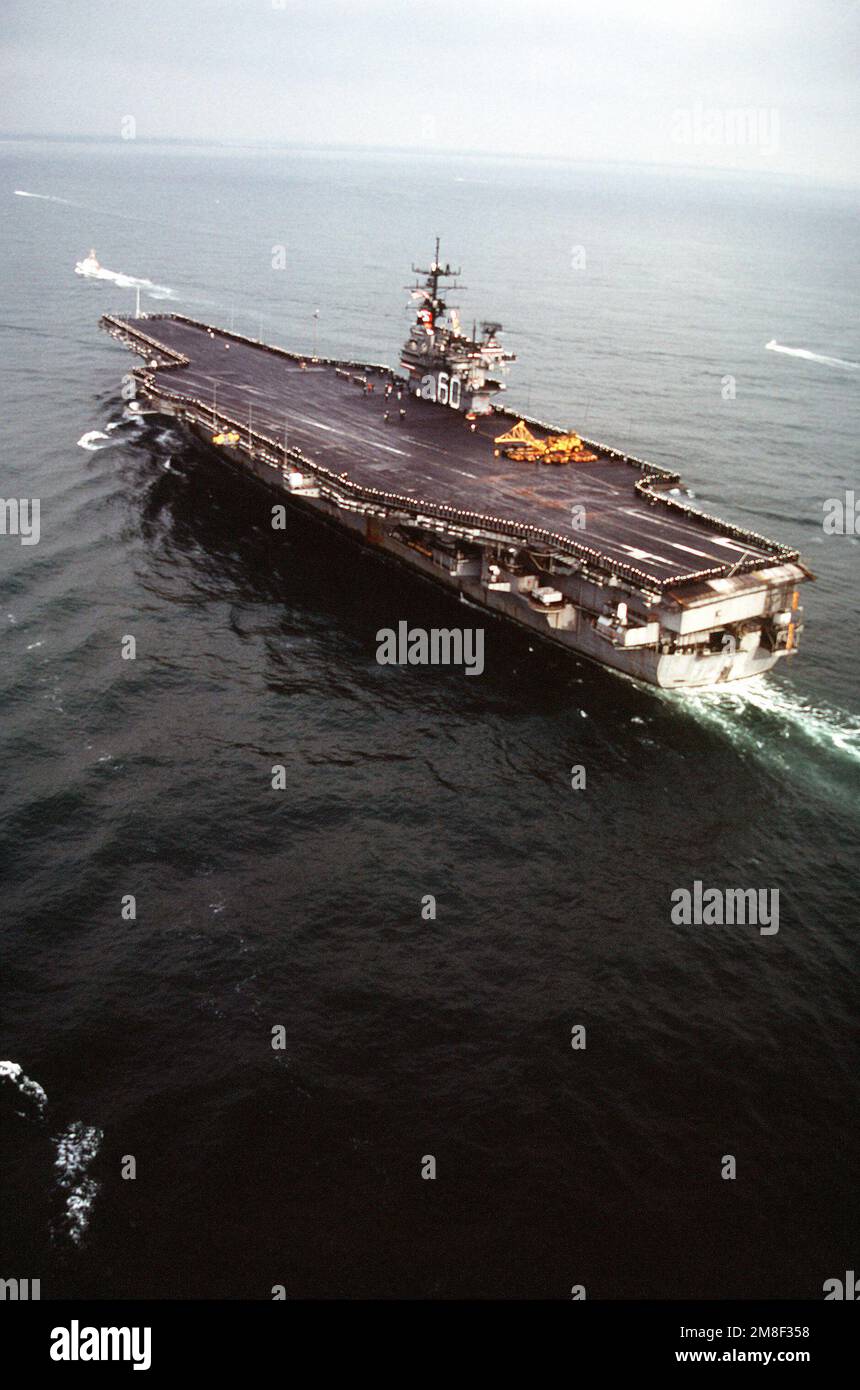 With its crew manning the rails, the aircraft carrier USS SARATOGA (CV ...