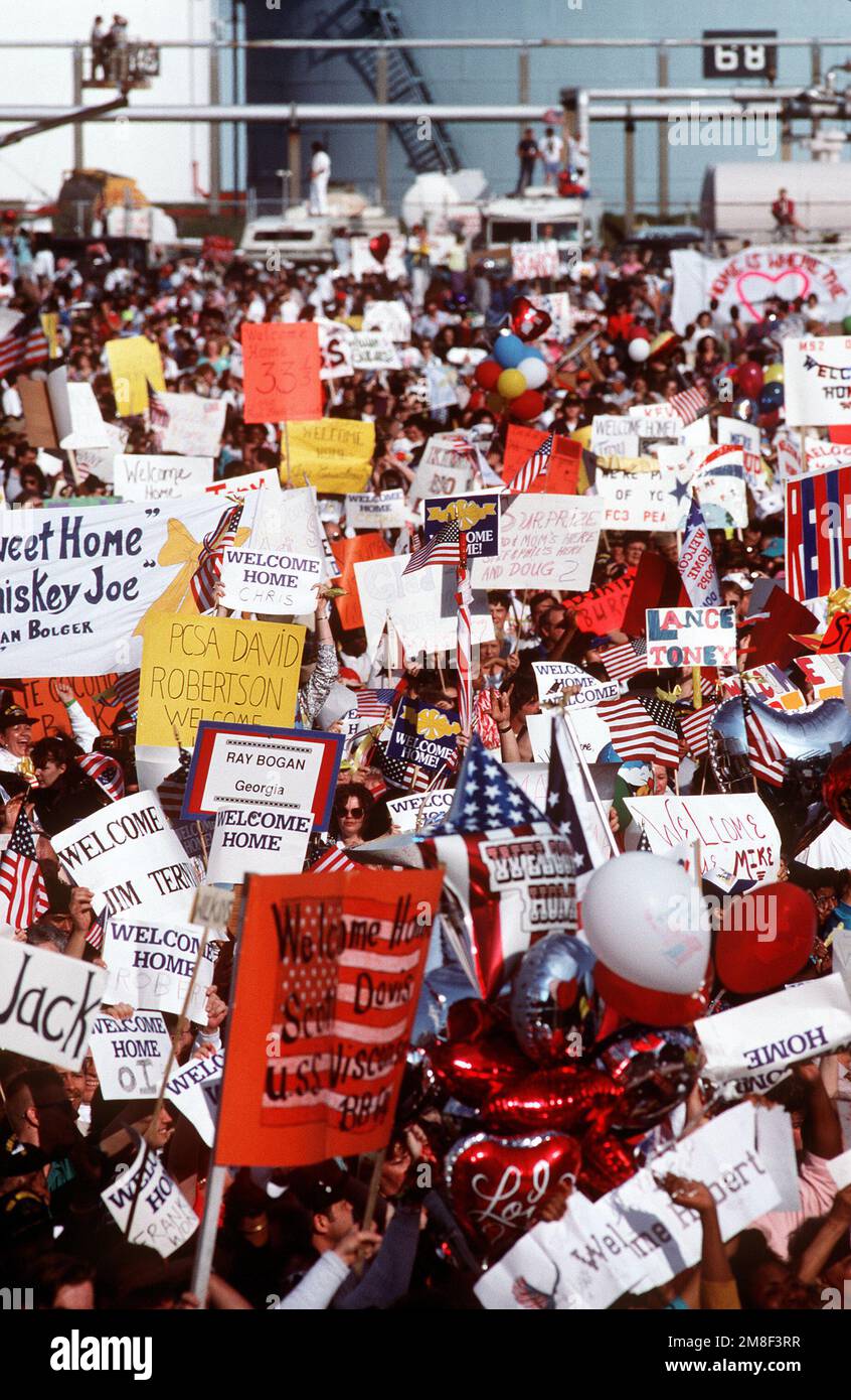 Friends and family members of crewmen assigned to the battleship USS ...