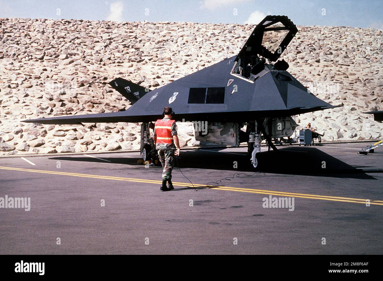 STAFF SGT. David Owings, crew chief, communicates with MAJ. Joe Bowley ...
