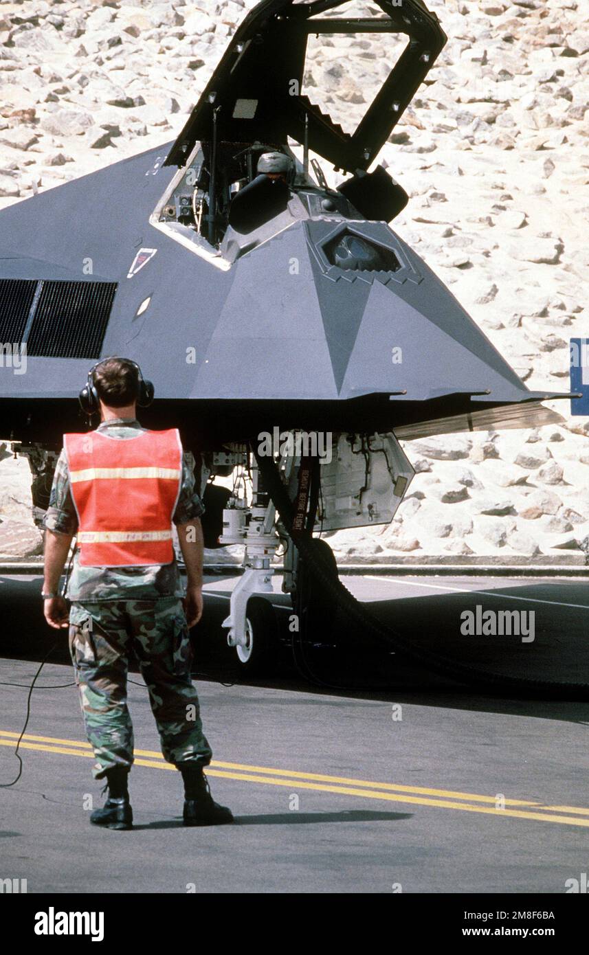 STAFF SGT. David Owings, crew chief, communicates with MAJ. Joe Bowley ...