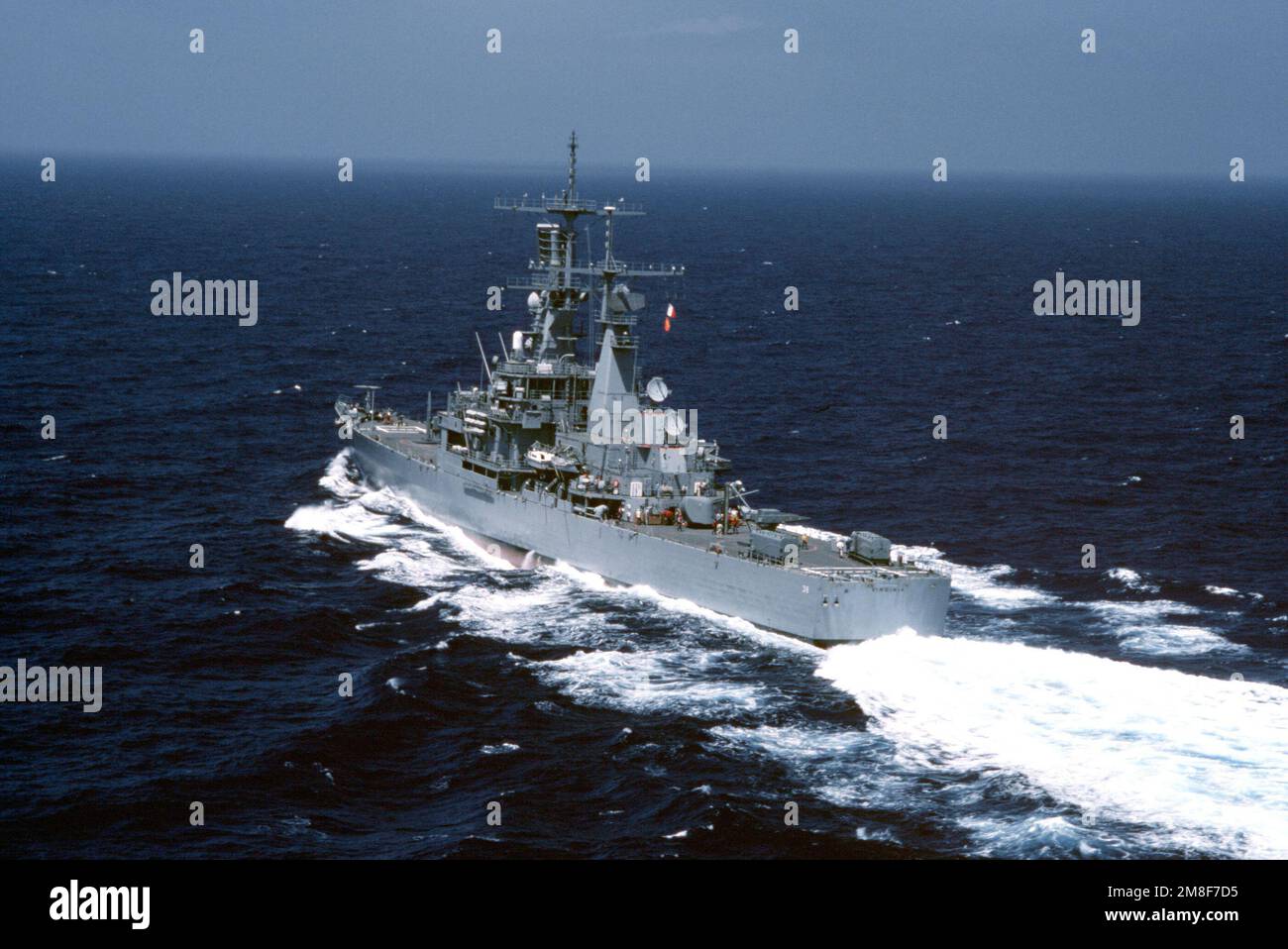 A port quarter view of the nuclear-powered guided missile cruiser USS ...
