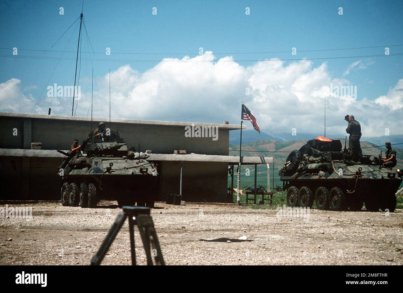Marines prepare to move out from a base camp in a LAV25 light armored ...