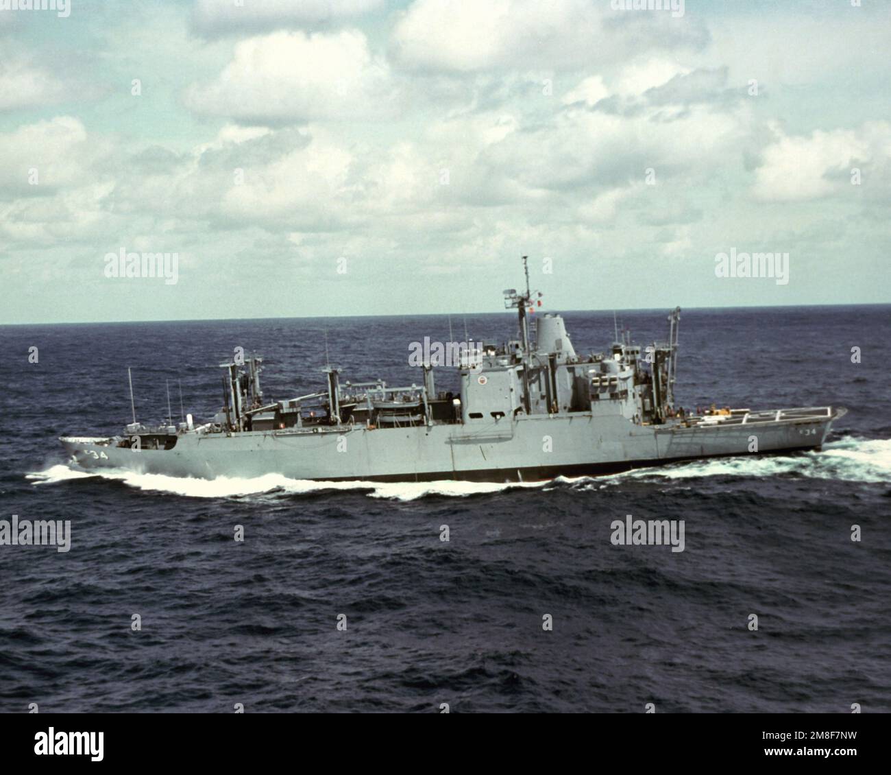 The ammunition ship USS MOUNT BAKER (AE-34) passes through heavy seas ...