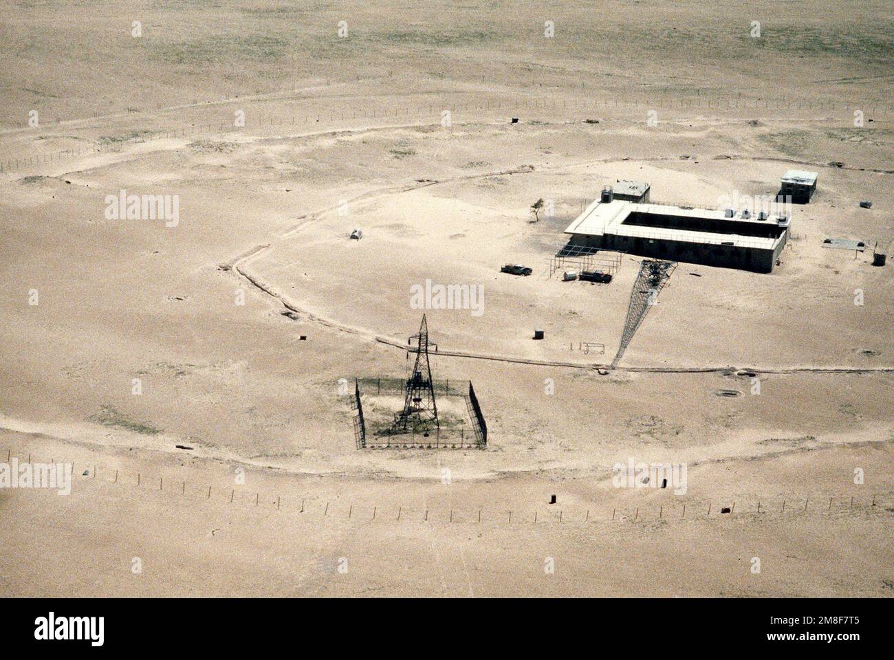 An aerial view of a collapsed telecommunications tower, damaged during ...