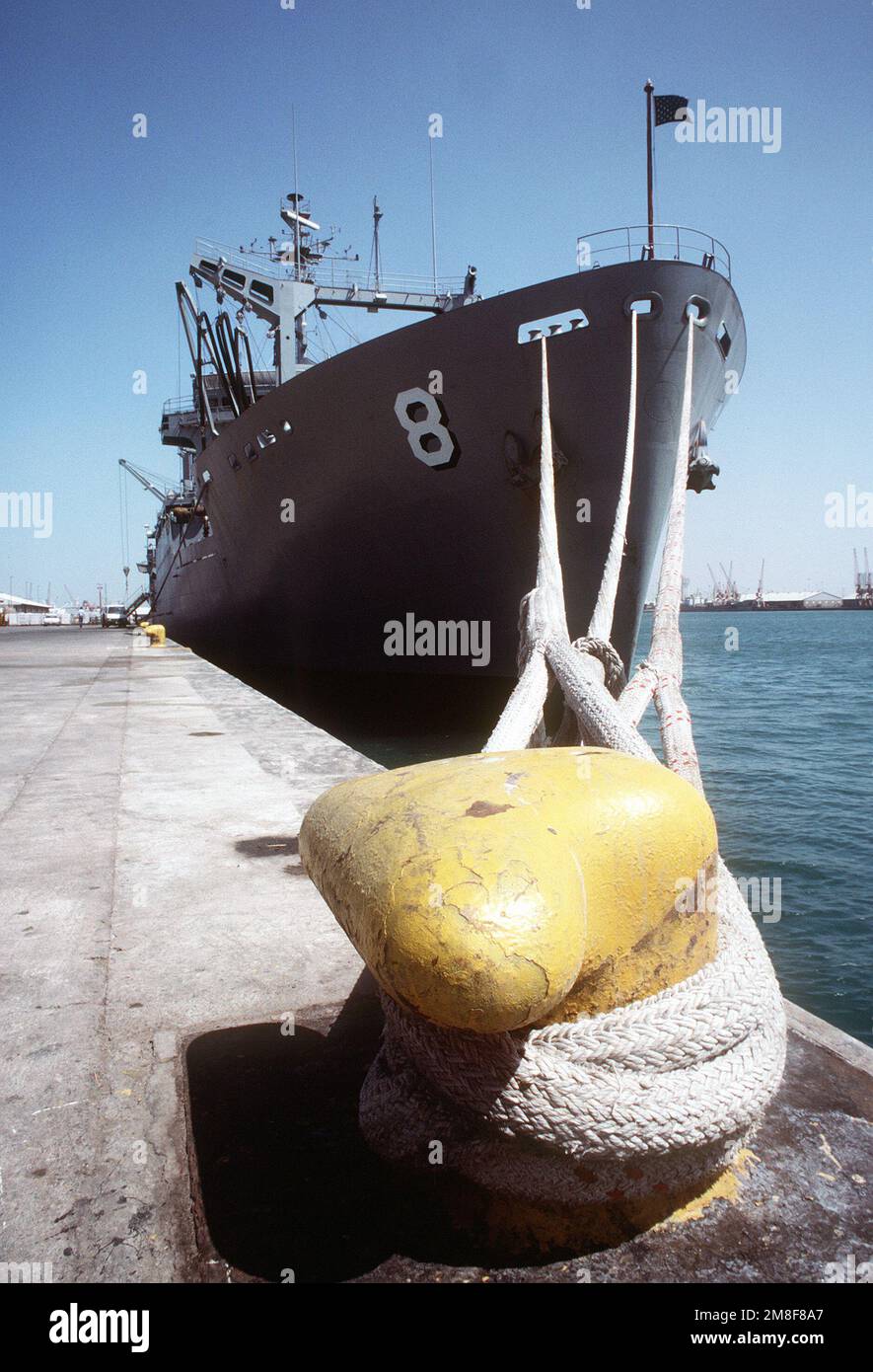 The Military Sealift Command combat stores ship USNS SIRIUS (T-AFS-8) tied up to take on cargo ...
