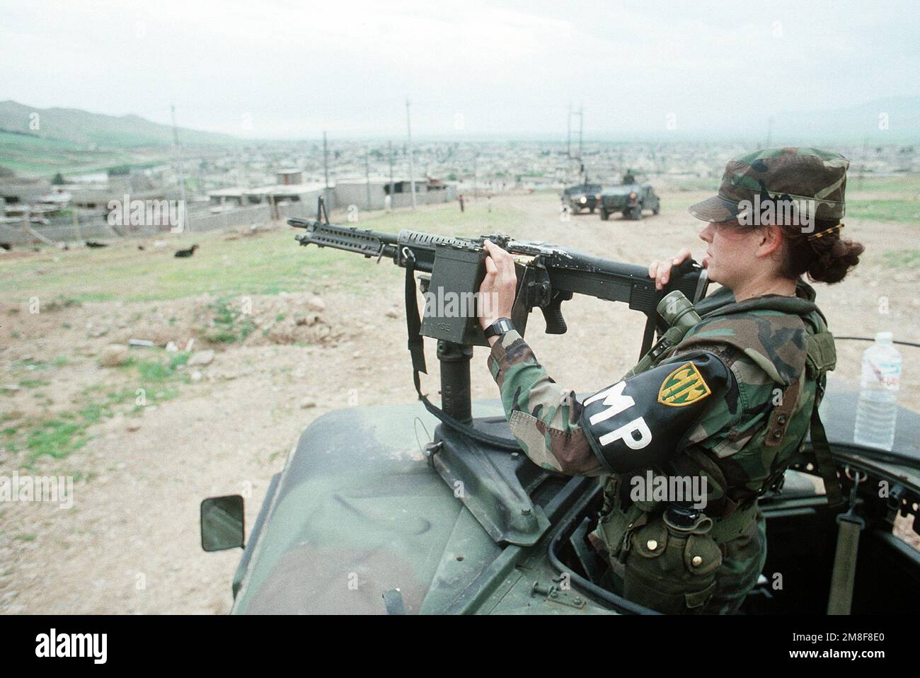 A military policewoman from the Army's 284th Military Police Company ...
