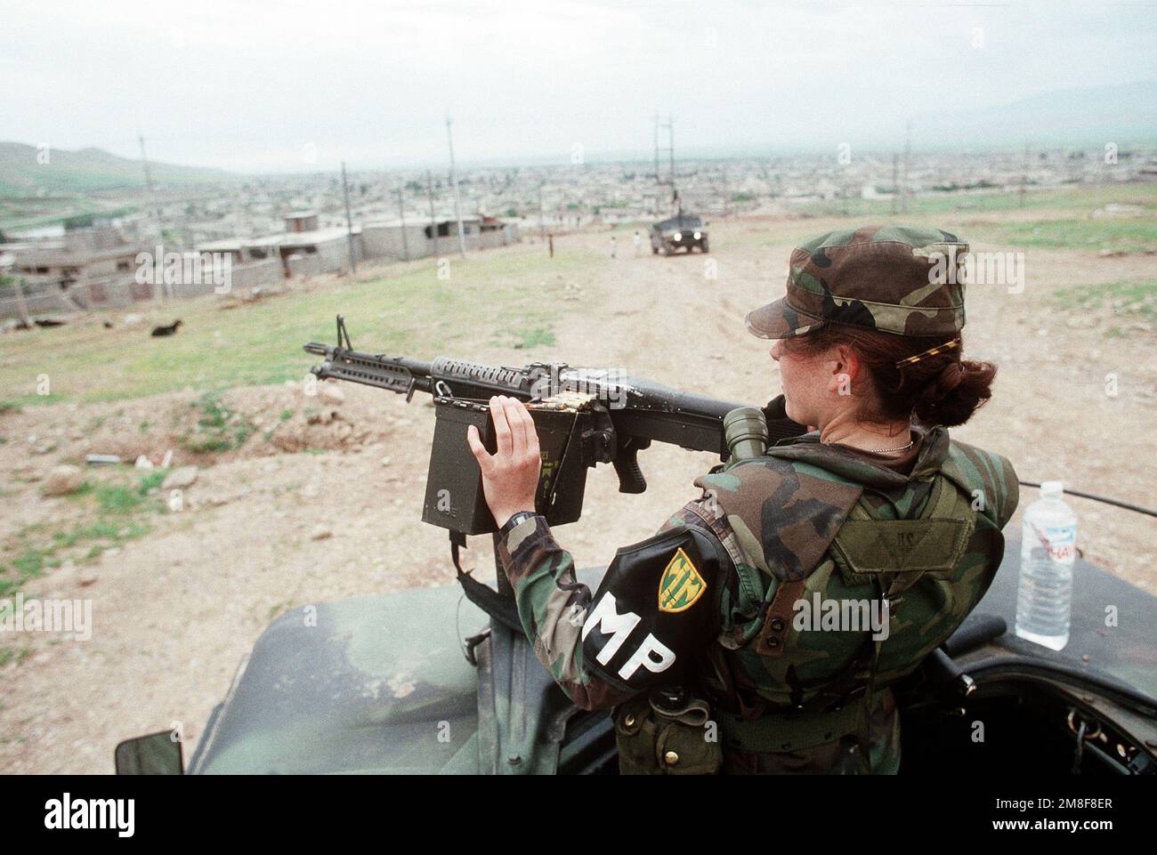 A military policewoman from the Army's 284th Military Police Company ...