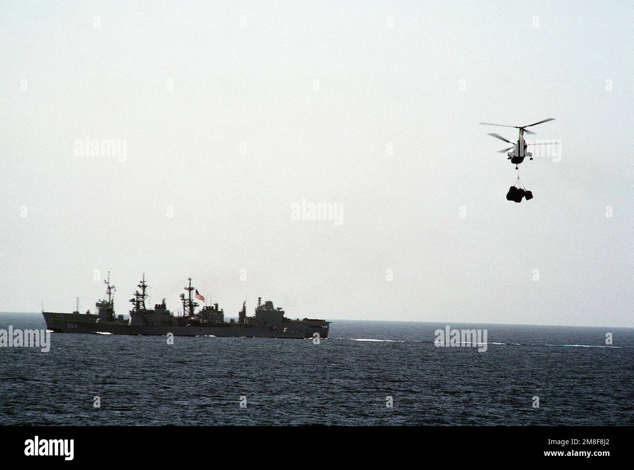 The destroyer USS PAUL F. FOSTER (DD-964) and the replenishment oiler ...