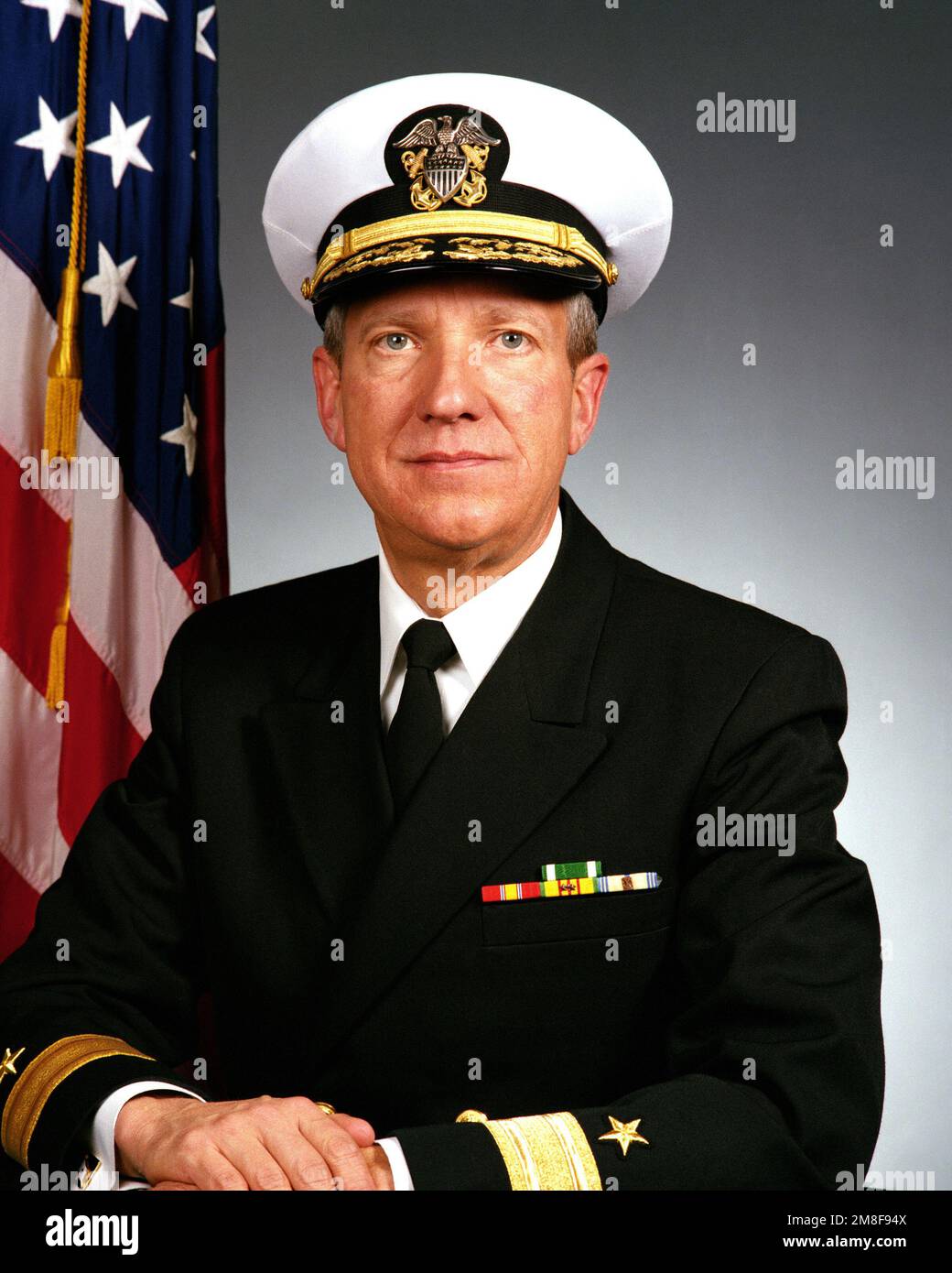 Rear Admiral (lower half) Richard L. Becker, USN (covered). Country ...