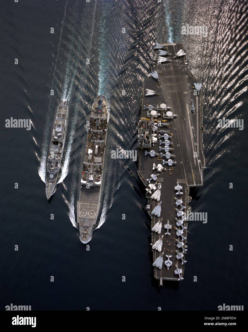 An overhead view of the oiler USNS PASSUMPSIC (T-AO-107) conducting an ...