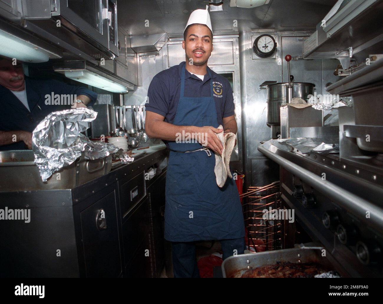 A mess management specialist aboard the nuclear-powered attack ...