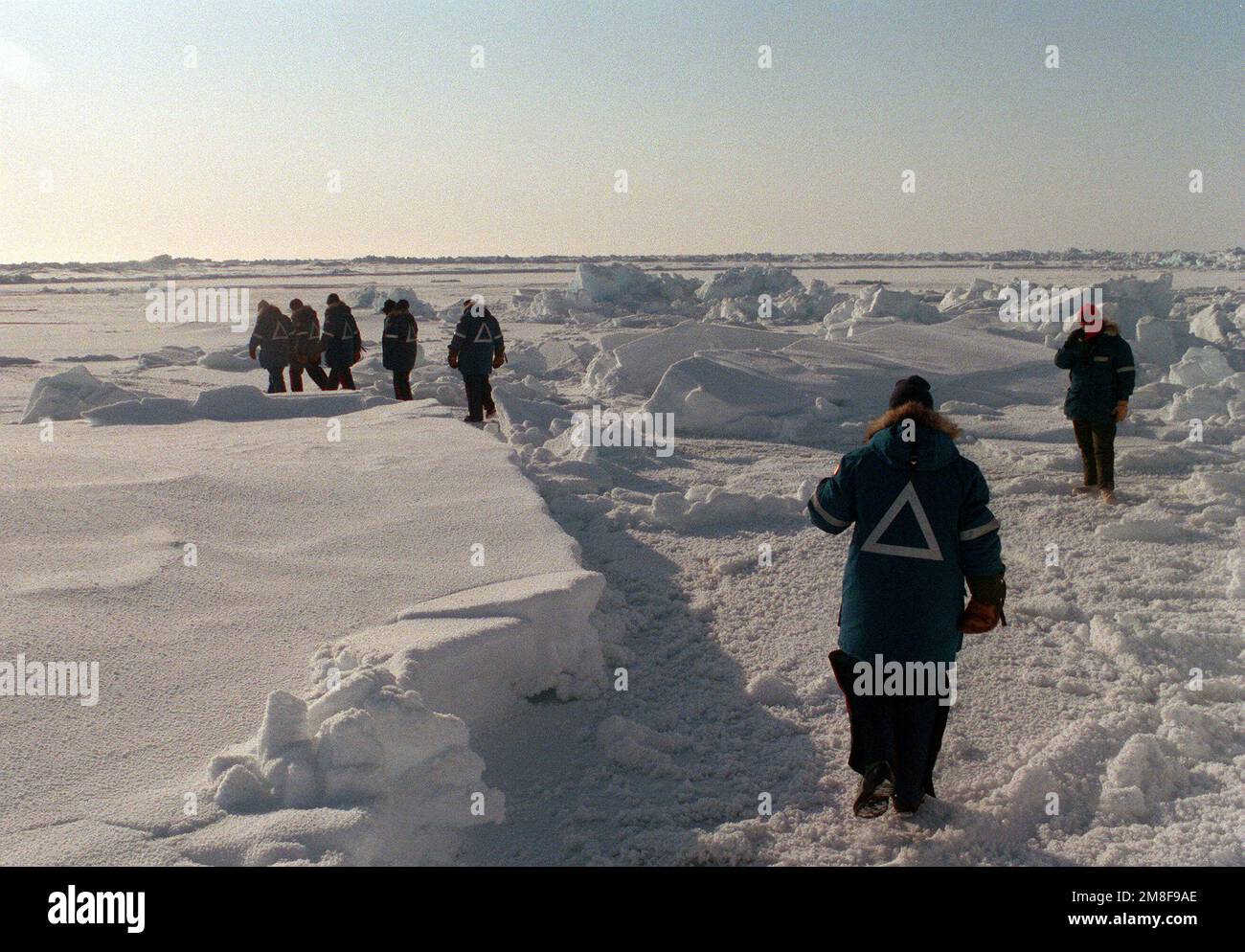 Members of an official party visiting the nuclear-powered attack ...