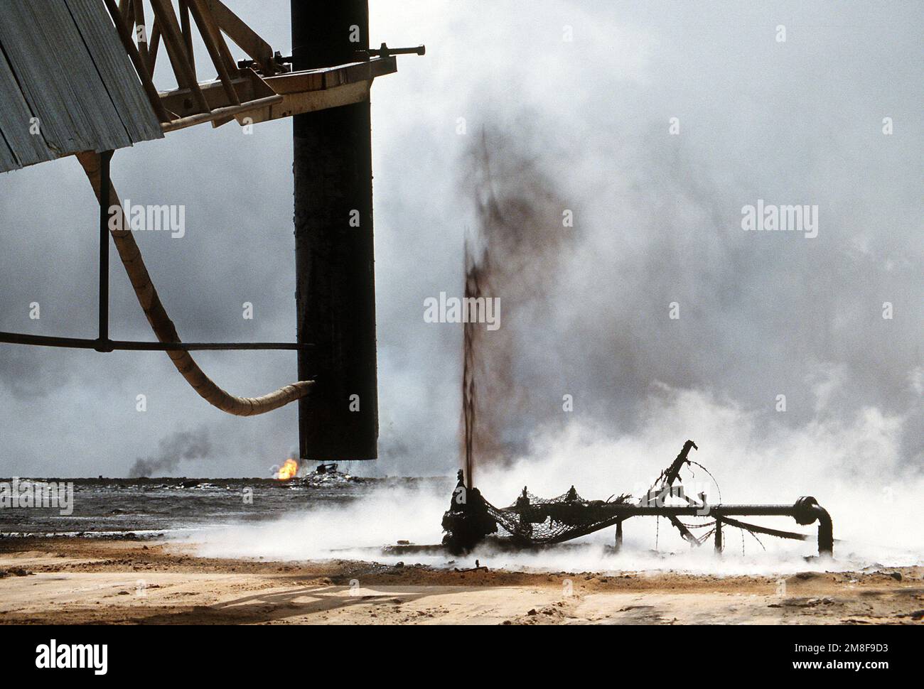 Firefighters from the Boots and Coots Oil Well Firefighting Company use ...