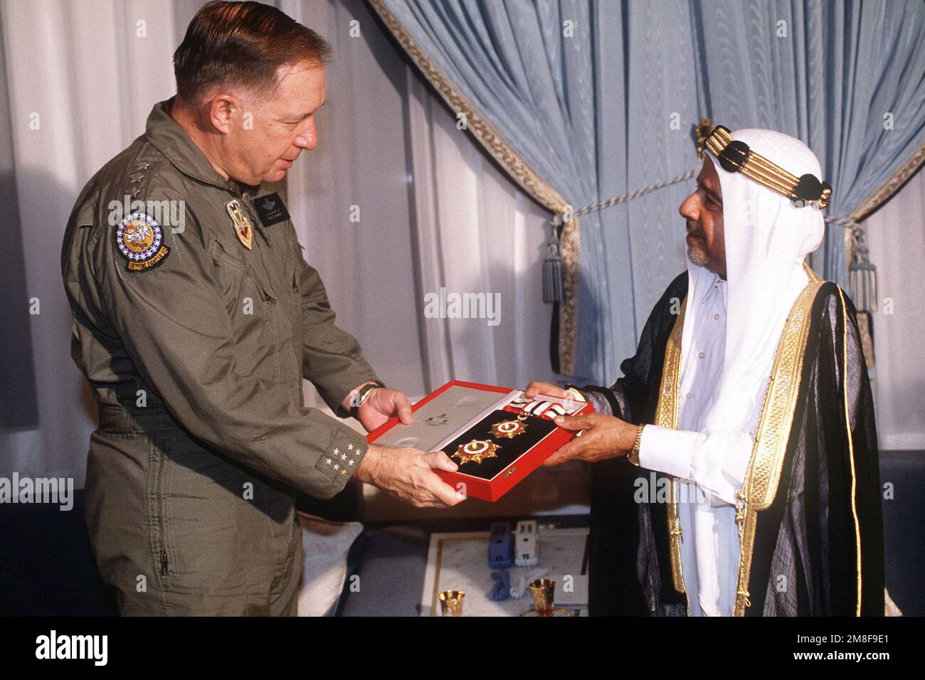 The Emir of Bahrain , Shaikh Isa Bin Sulman Al-Khalifa, presents the ...