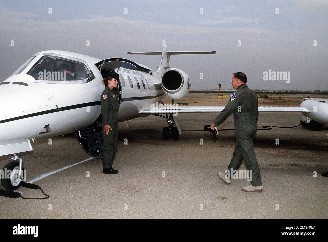 First LT. Jennifer Bier, 1402nd Military Airlift Squadron, stands at ...
