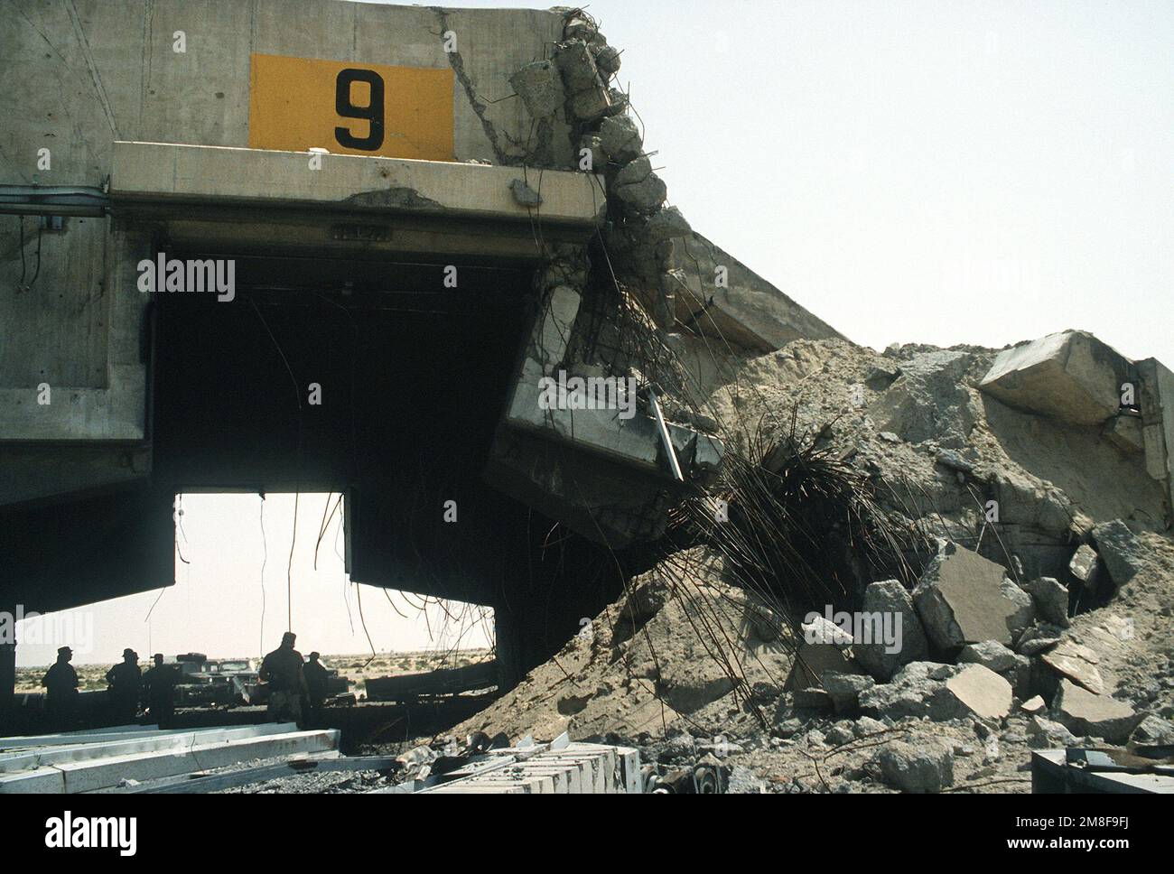 A hardened aircraft shelter at Ali Al Salem Air Base, damaged during ...