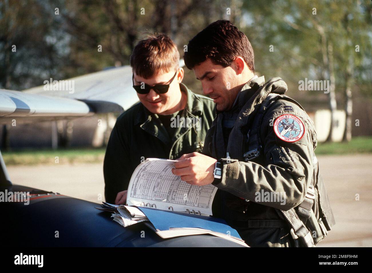 CPT Trueba, right, the pilot of a 26th Tactical Reconnaissance Wing ...