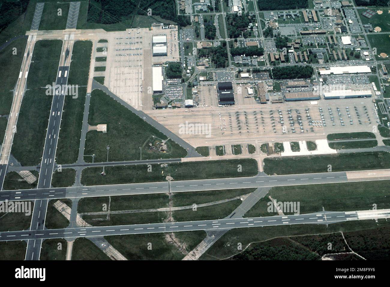 An aerial view of a portion of the air station. Base: Naval Air Station ...