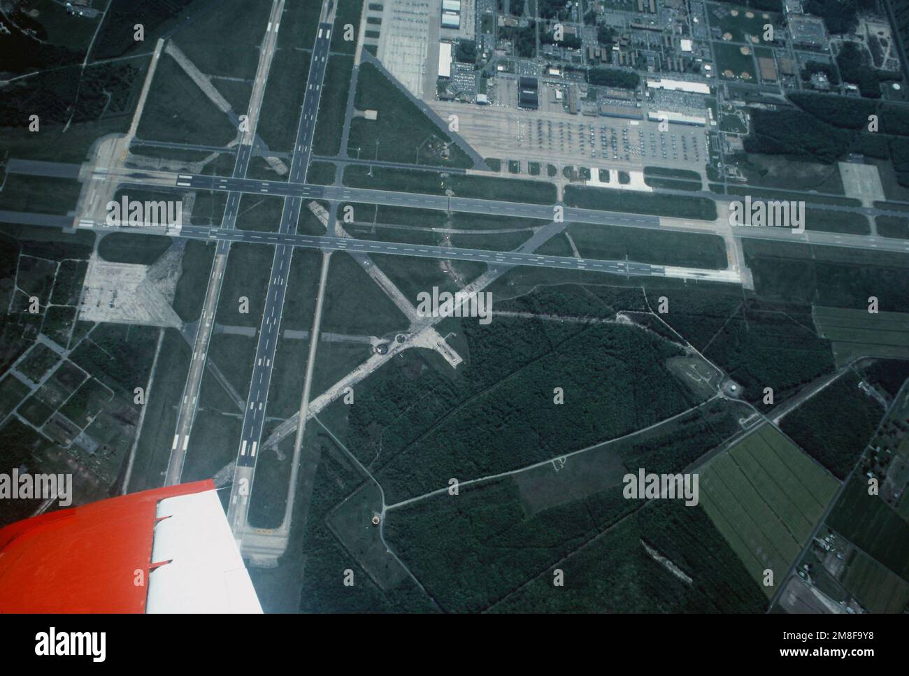 An aerial view of a portion of the air station. Base: Naval Air Station ...