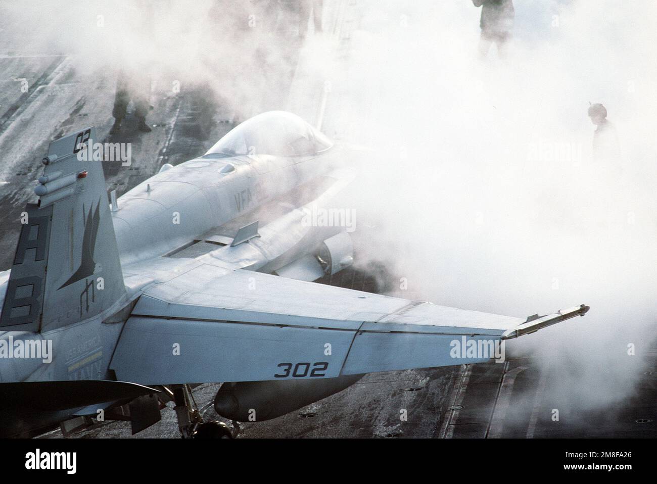 A Strike Fighter Squadron 82 (VFA-82) F/A-18C Hornet aircraft taxis ...