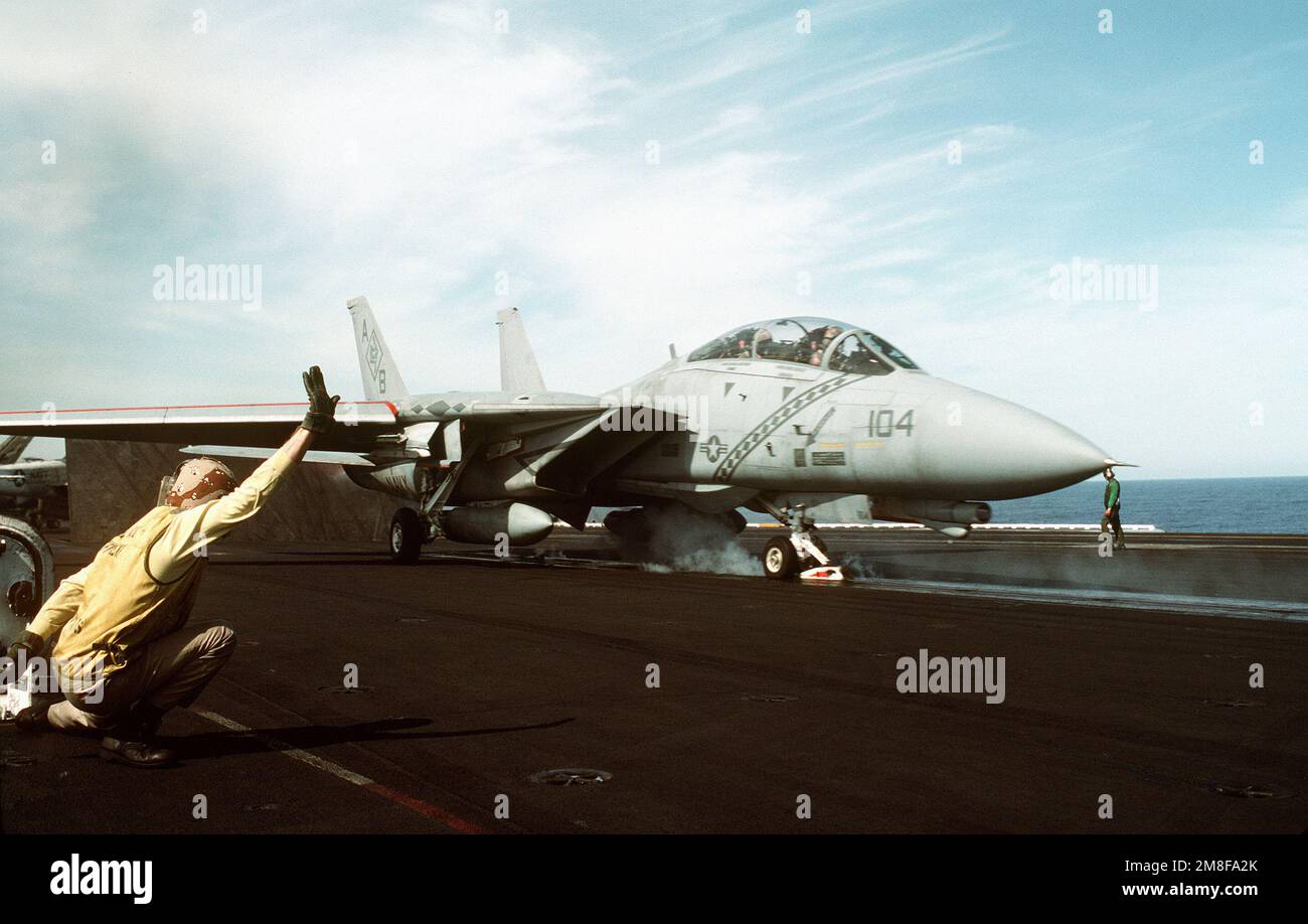 A catapult officer aboard the aircraft carrier USS AMERICA (CV-66 ...