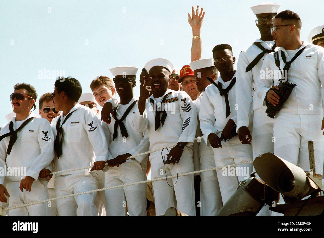 Sailors aboard the amphibious transport dock USS RALEIGH (LPD-1) gather ...
