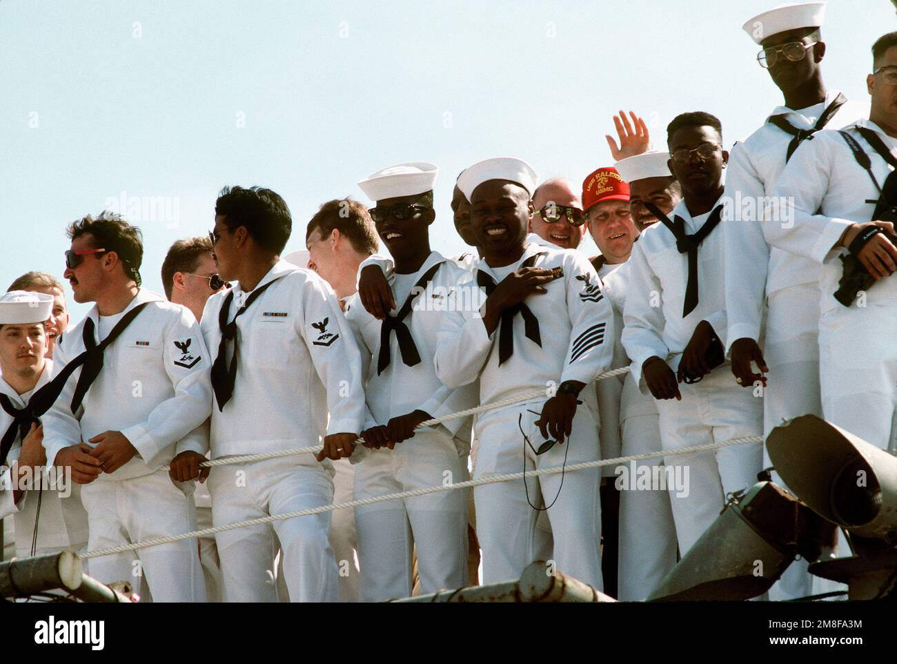 Sailors aboard the amphibious transport dock USS RALEIGH (LPD-1) gather ...