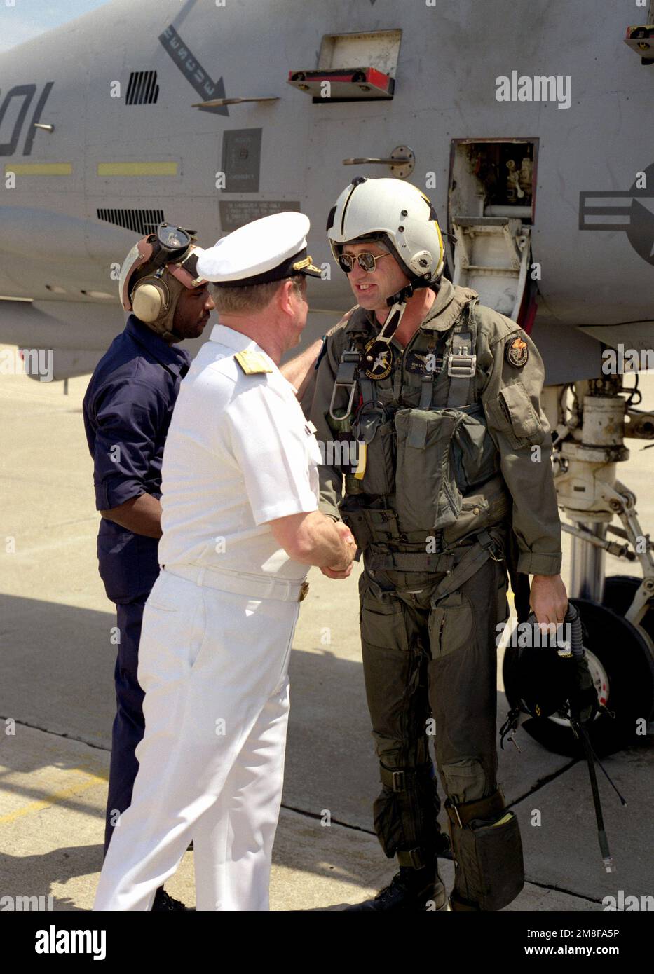 Vice Adm. John K. Ready, commander, Navy Air Force, U.S. Atlantic Fleet, greets CMDR. Larry H ...