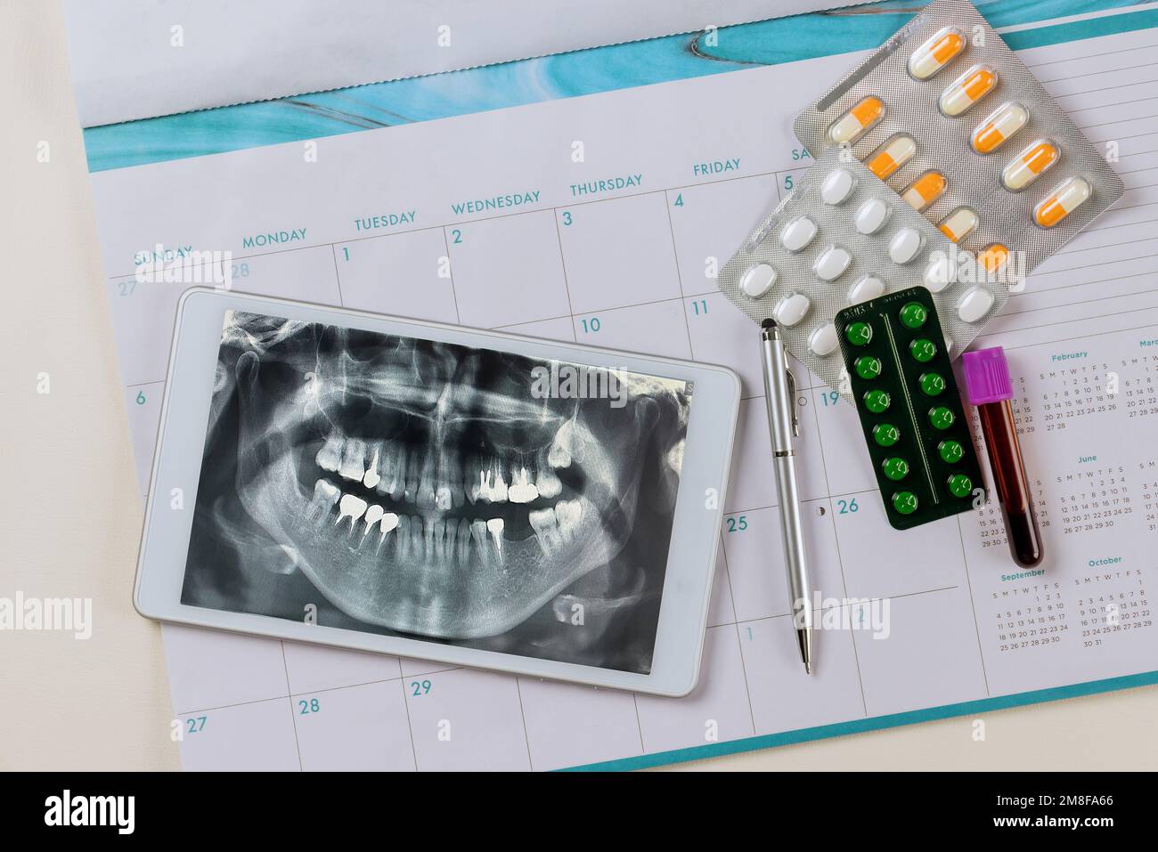 Doctor examines teeth xray on hi-res stock photography and images - Alamy