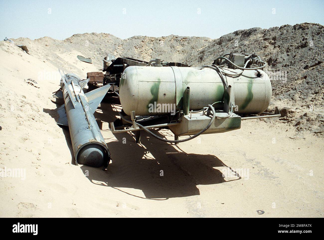 An Iraqi SA-2 surface-to-air missile launcher trailer damaged near Ali ...