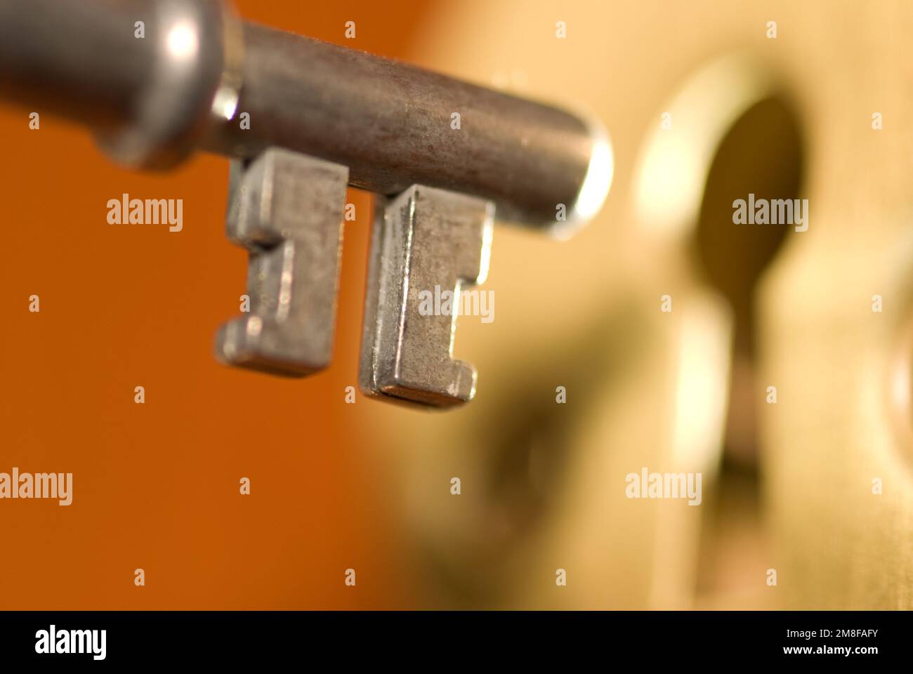 Key and door lock keyhole Stock Photo - Alamy