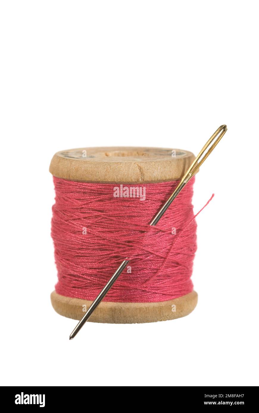 Old wooden reel of thread on white Stock Photo - Alamy