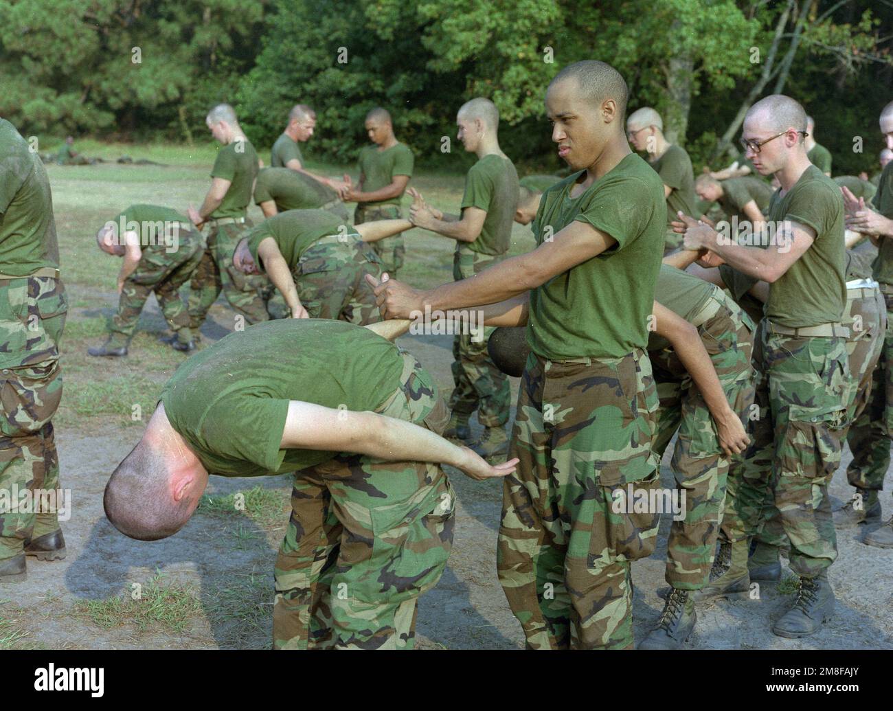 3rd Battalion recruits practice an arm lock maneuver during hand-to ...